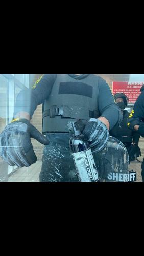 PHOTOS: Protesters gather outside 201 Poplar | | fox23.com