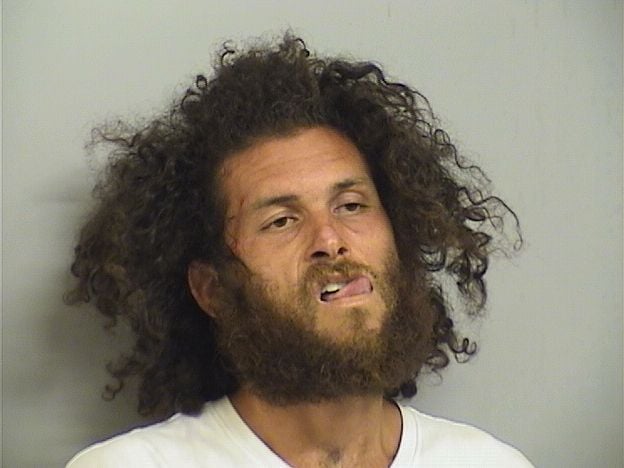 Man arrested after 15 Tulsa Police cars vandalized | News | fox23.com