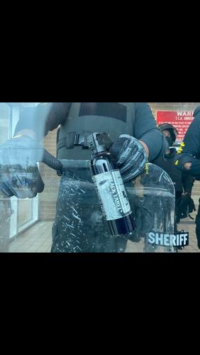 PHOTOS: Protesters gather outside 201 Poplar | | fox23.com