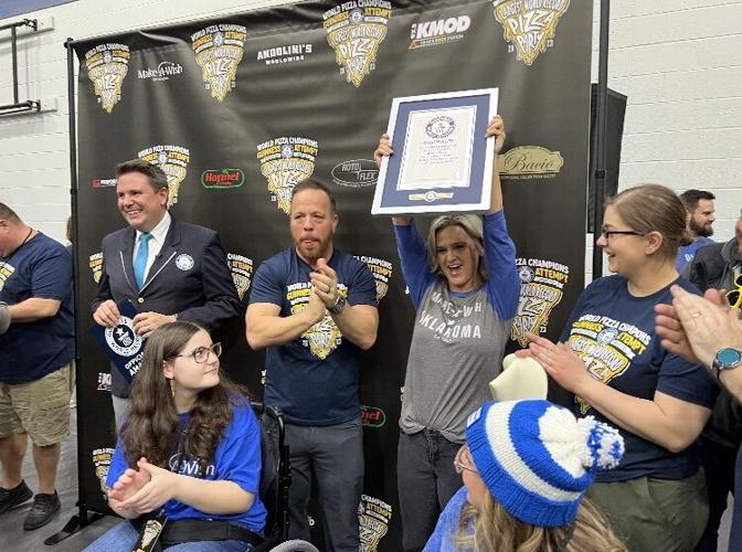 Photos: World record for largest pizza party set at TU basketball game ...