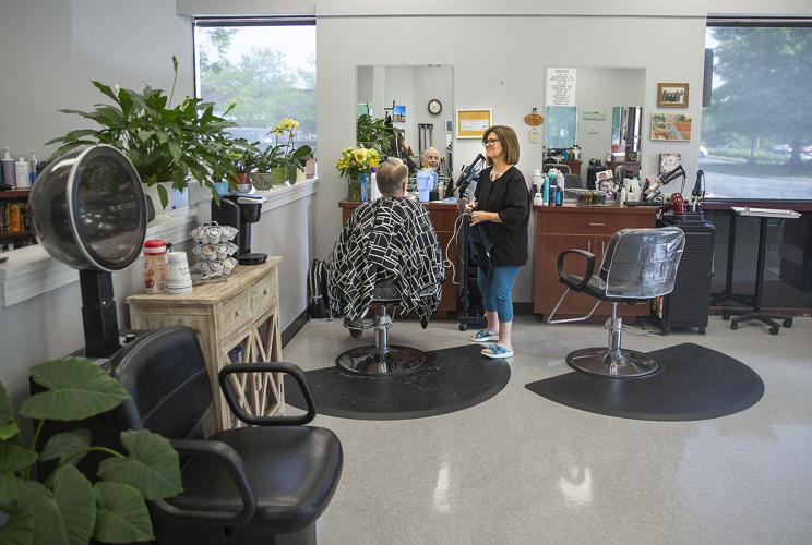 'Delightful hairdresser' puts away scissors after 54 years