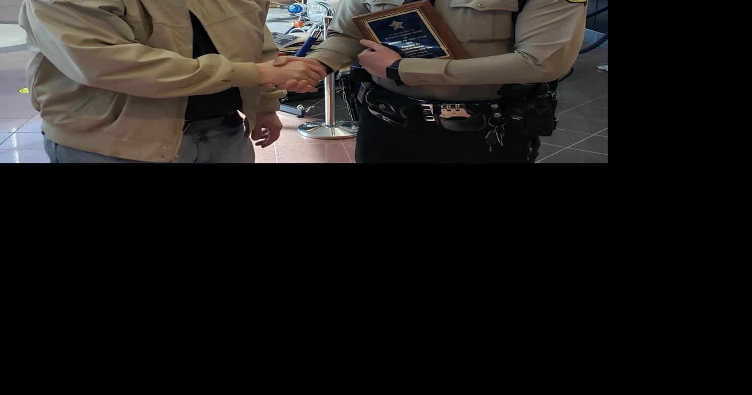 RURITAN CLUB: Members present Rookie of the Year award