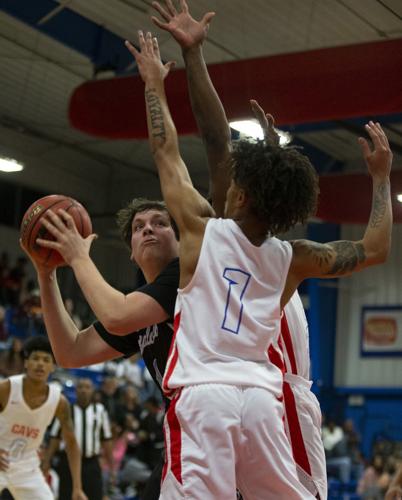 High school boys basketball: As Kaylen Taylor steps up, Caroline downs ...