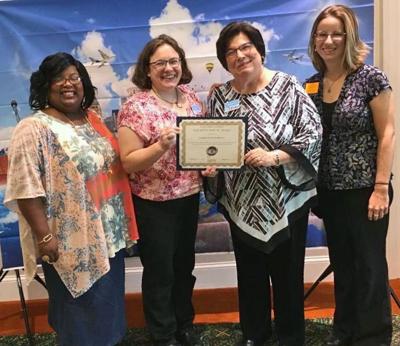 PARTNERS: Salem Church Library branch recognized for help in feeding ...