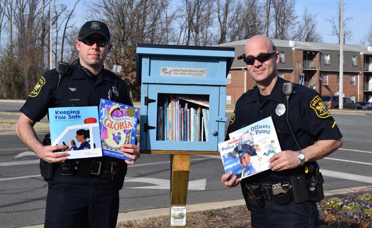 Fredericksburg police help promote reading with Little Free Library