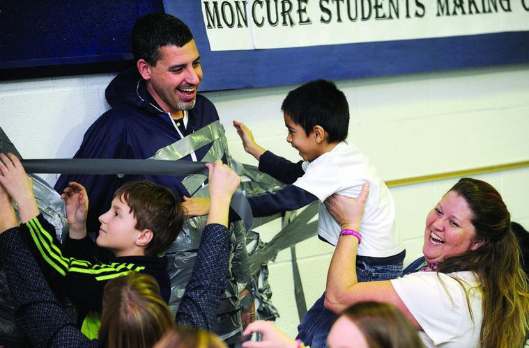 School leaders duct taped to wall, raise more than expected