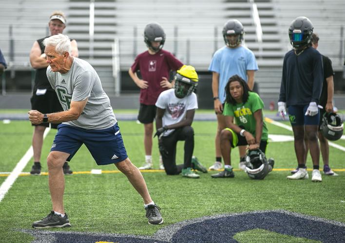 High school football teams open practice in the heat