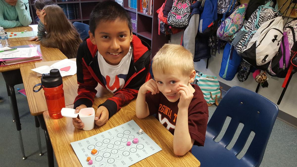 BUDDY SYSTEM: Battlefield Elementary students share love of learning