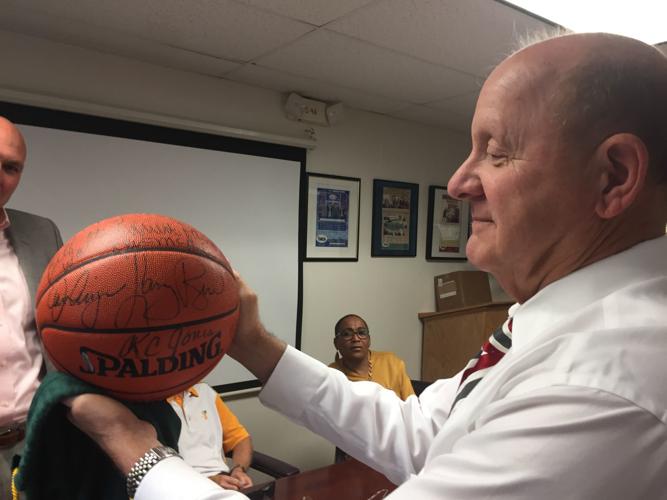 Ron Rosner surprises friend and YMCA board member with special gift