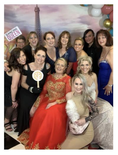 OUT, ABOUT: Rotarians enjoy evening at Mom Prom