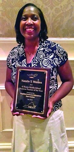 Stafford teacher honored for making middle-school business course fun