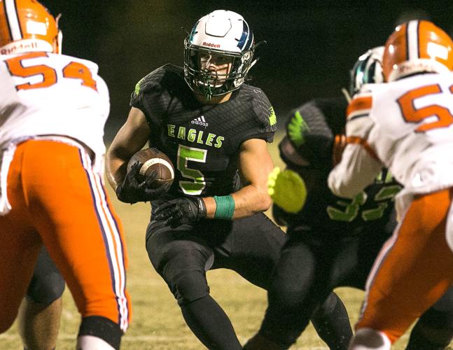 High school football: Lowe steps up all facets of his game to lead ...