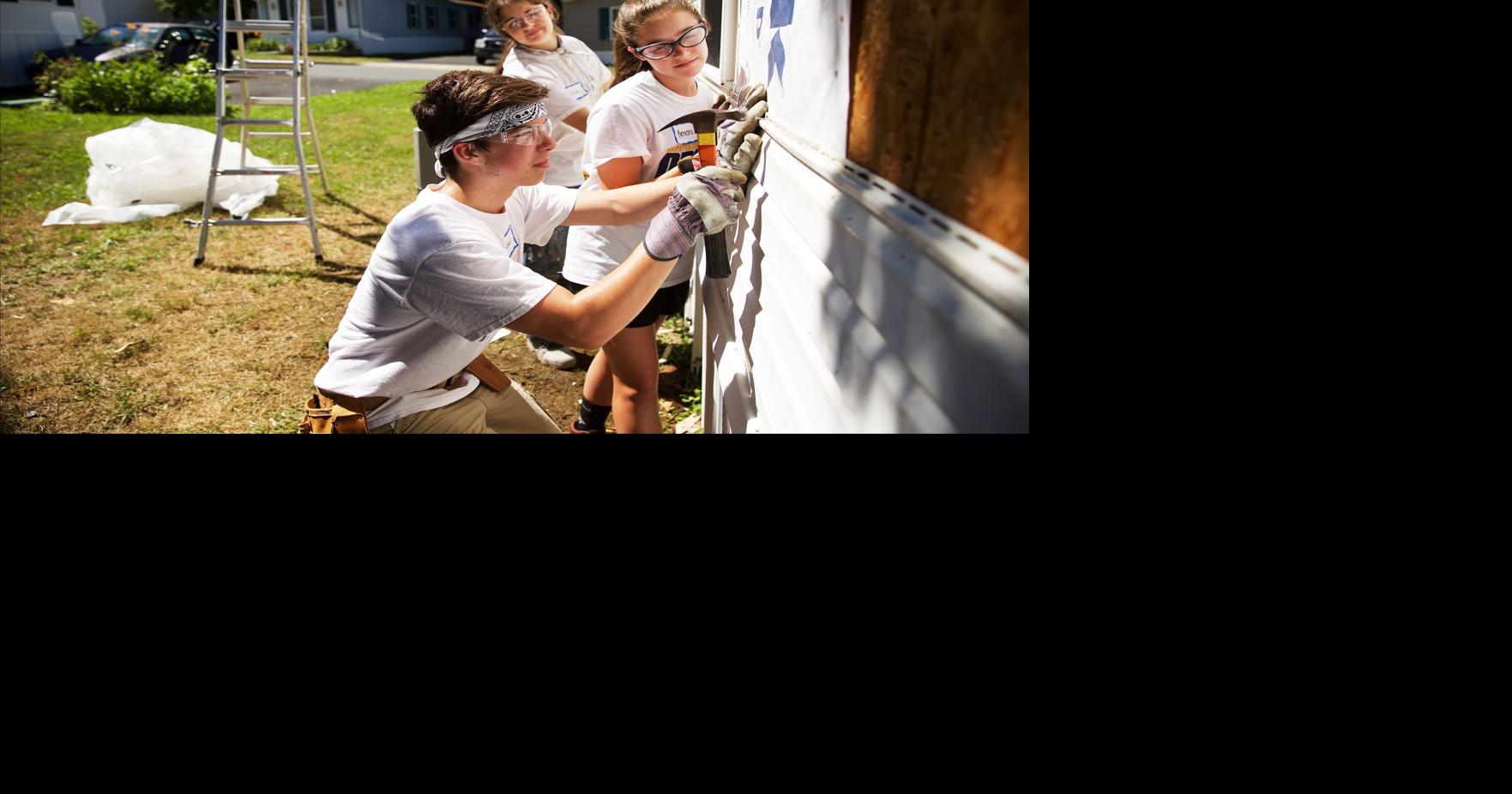 Teenagers spend part of summer repairing homes