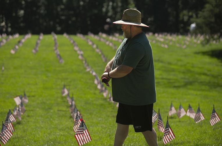 Spotsylvania man decorates graves at Quantico with flags