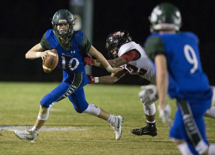 High school football: Brooke Point overcomes mistakes to clinch No. 1 seed