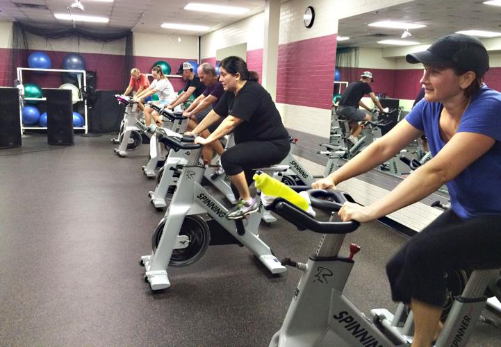 Spinning classes at YMCA help keep bike riders in shape