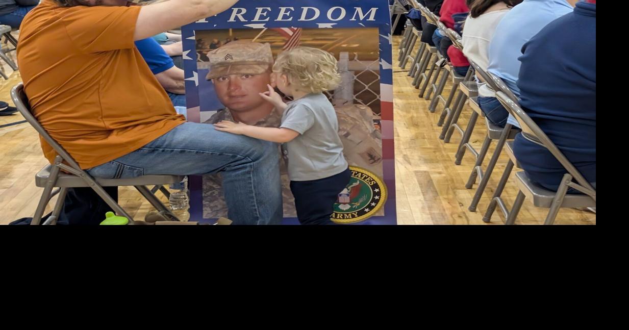 Attendees of the May 2 "Faces of Freedom" banner celebration, Jan Yanke ...
