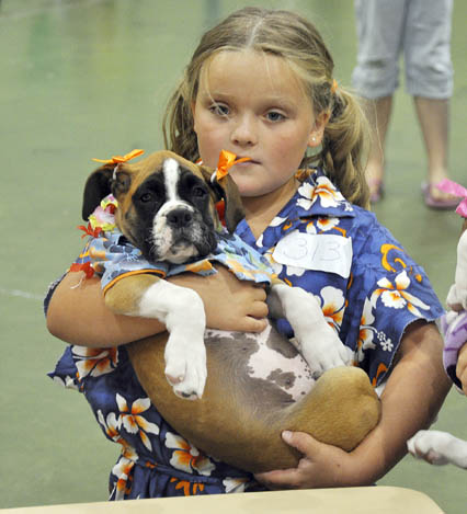 Kids show off their pets during city wide pet show