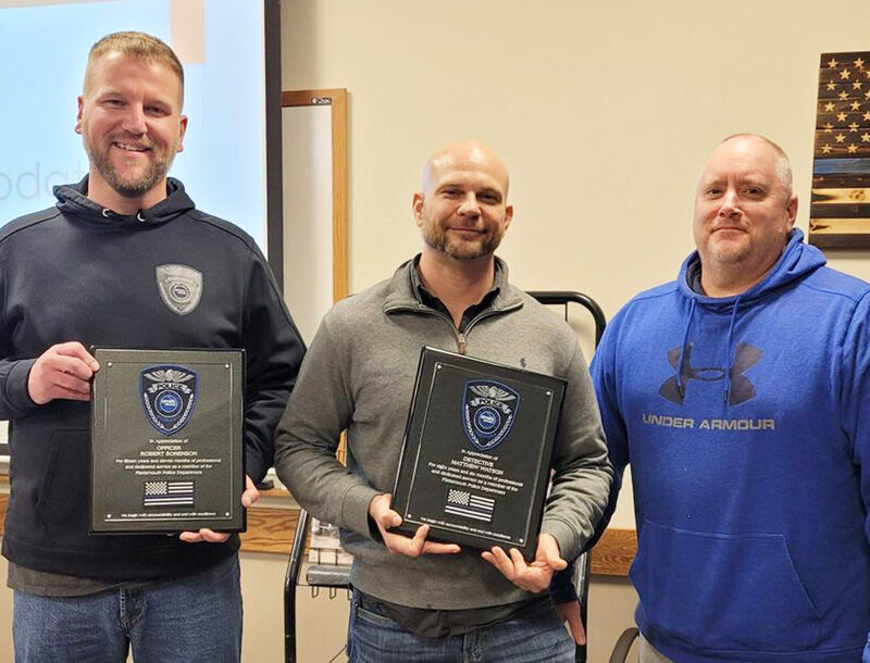 Police honor two departing members