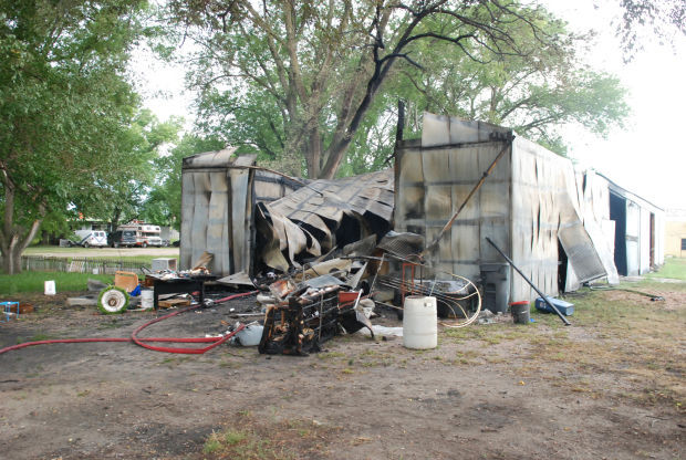 Authorities search for cause of storage building blaze