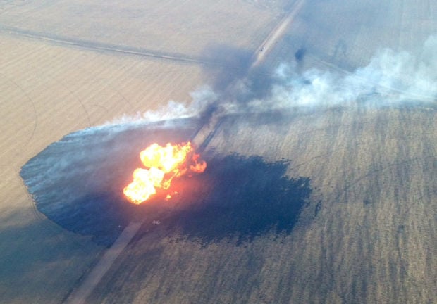 Towering inferno: Natural gas pipeline fire forces family to flee ...