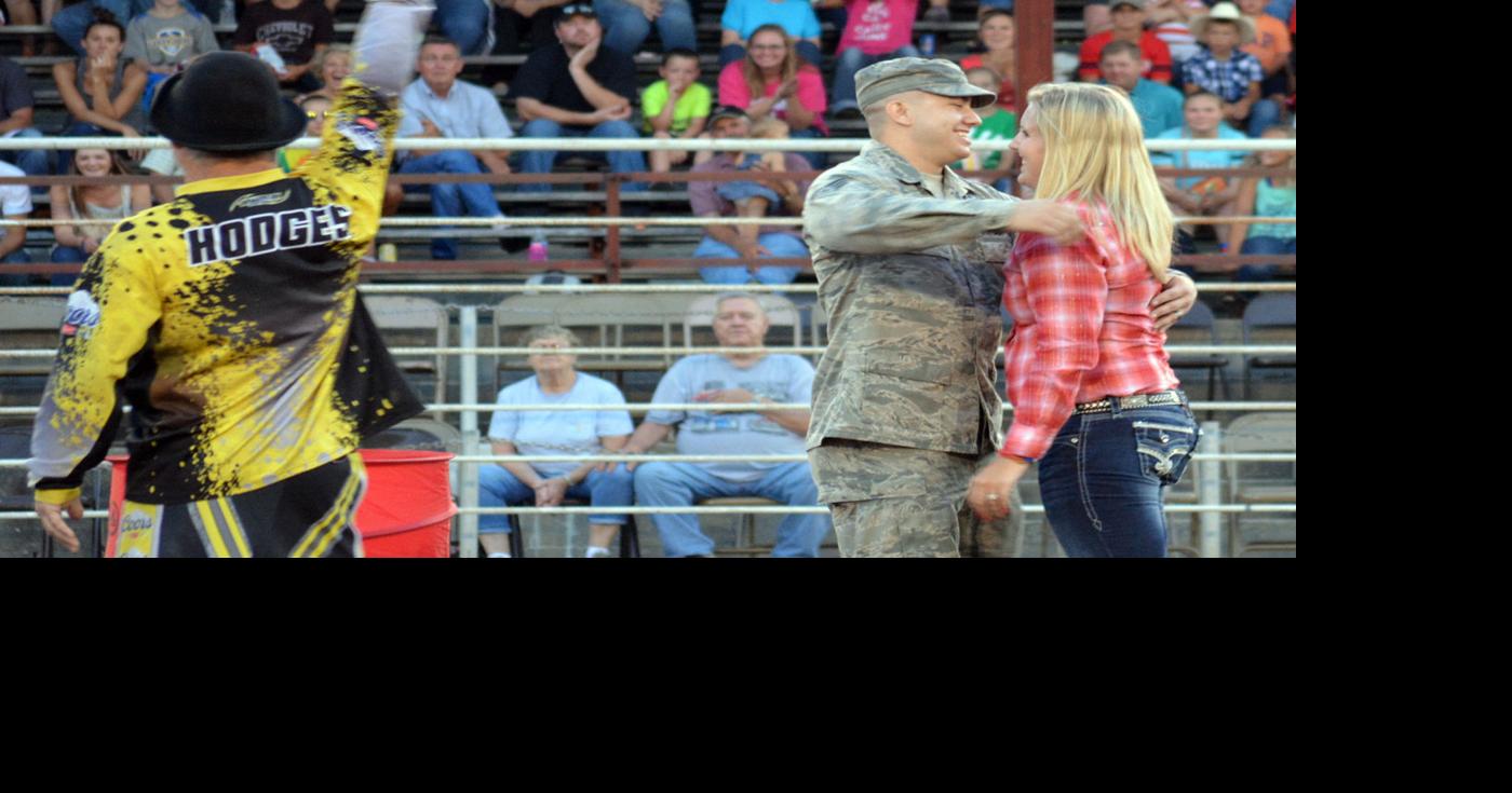 Air Force member surprises wife at Wahoo Rodeo