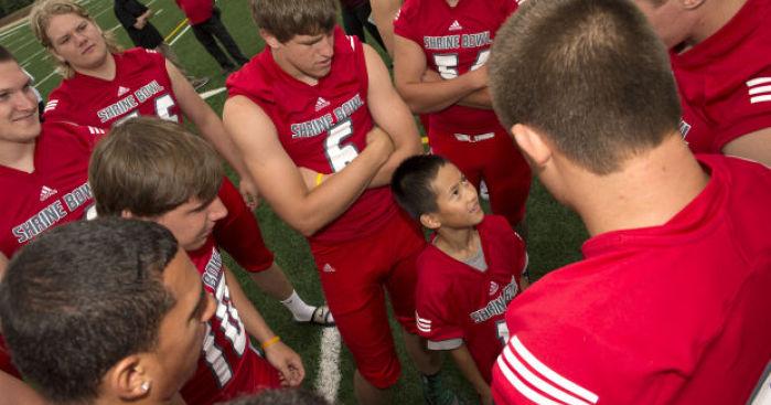 Conrad, Voss learn a lesson at Shriners Hospital