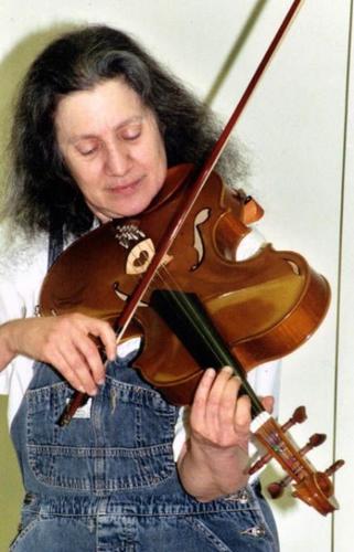 Woman ‘fiddles’ with poetry, music