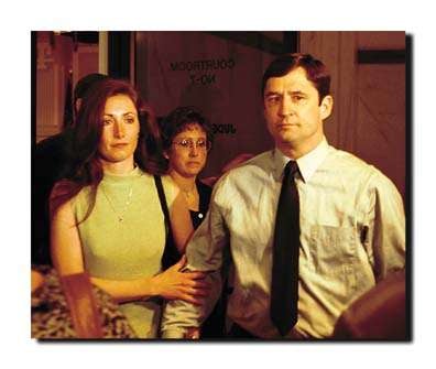Susan Stahlecker and Dave Belak walk out of the Douglas County ...