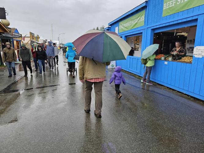 ‘Rain or shine, it's always a good time’ Visitors refuse to let the ...