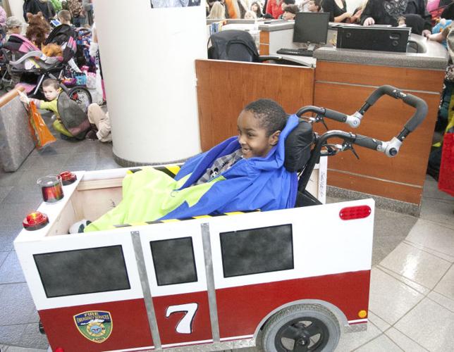 Photos:Eric Edwards gets new fire truck wheelchair | Featured ...