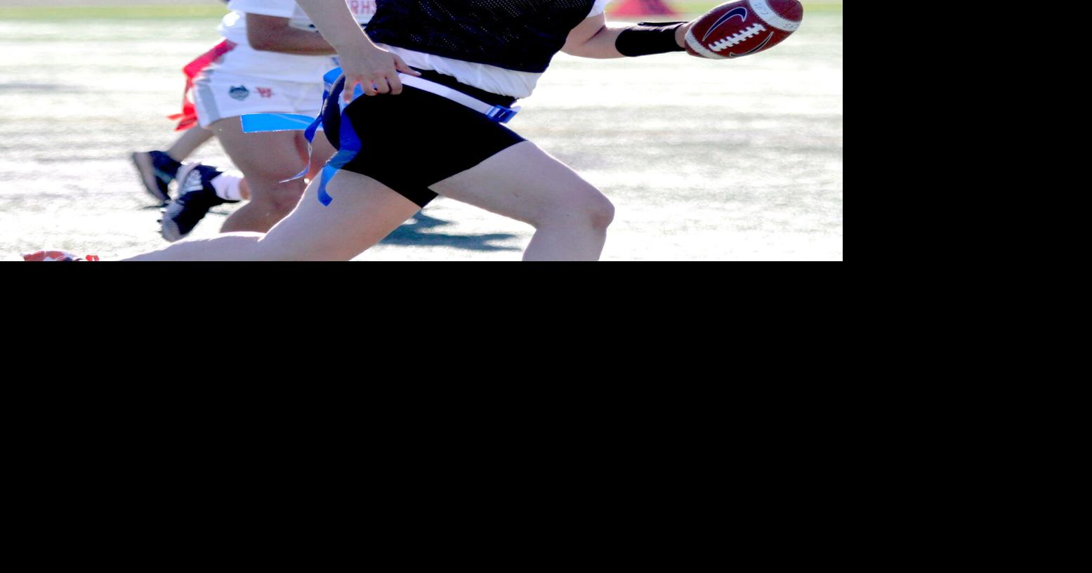 A new era: Local teams take the field for a girls flag football game ...