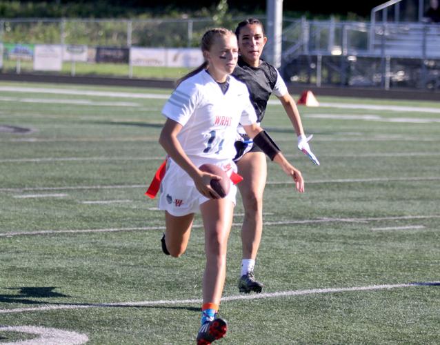 A new era: Local teams take the field for a girls flag football game ...