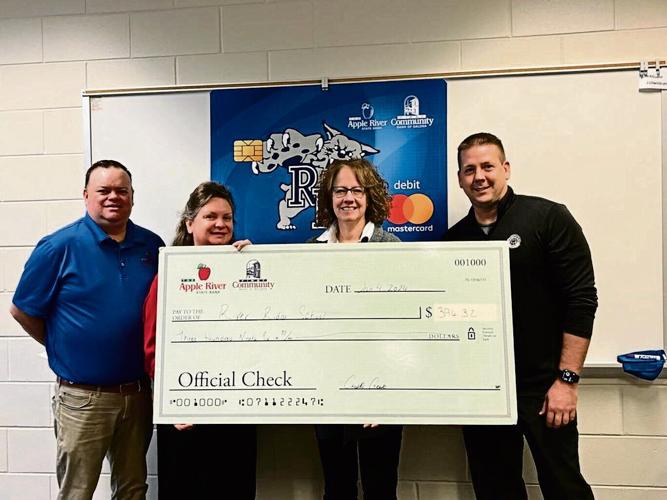 Apple River State Bank donates funds raised from mascot debit cards to ...