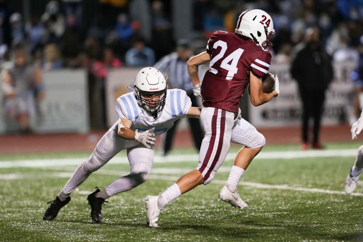 Prep football: Worsch carries Spartans past Raiders
