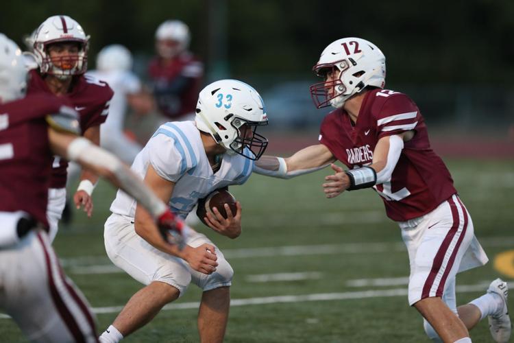 Prep football: Worsch carries Spartans past Raiders