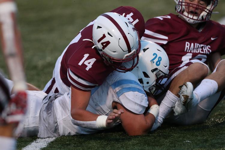 Prep football: Worsch carries Spartans past Raiders