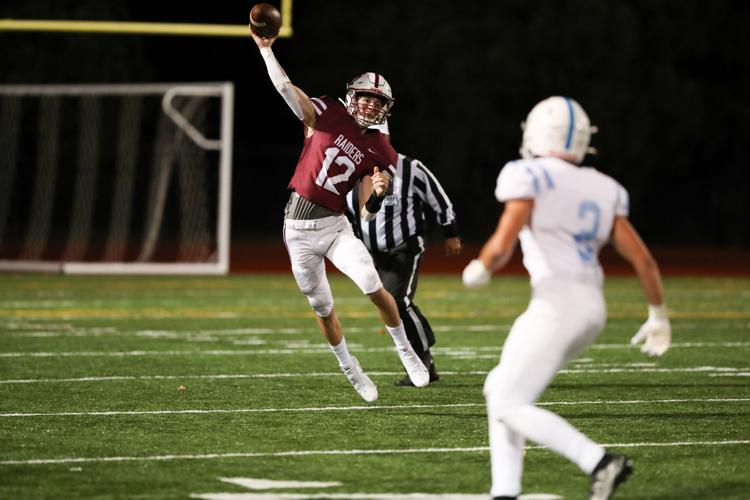 Prep football: Worsch carries Spartans past Raiders