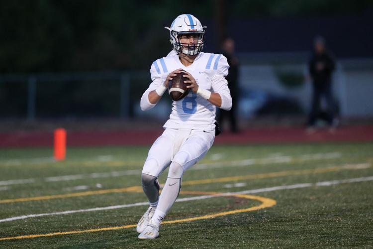 Prep football: Worsch carries Spartans past Raiders