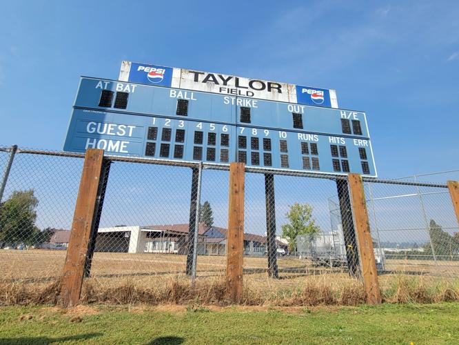 Sponsorship signs come down from Taylor Field's outfield