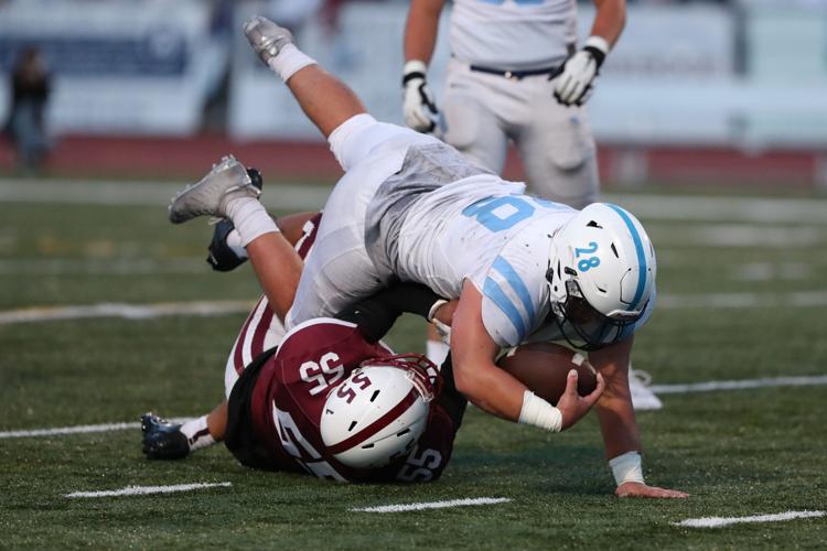 Prep football: Worsch carries Spartans past Raiders