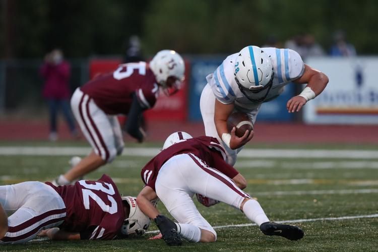 Prep football: Worsch carries Spartans past Raiders