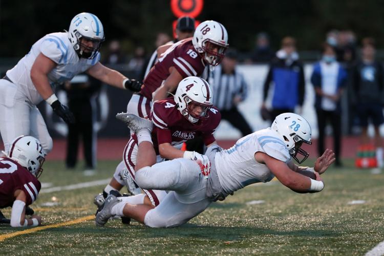 Prep football: Worsch carries Spartans past Raiders