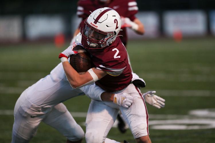 Prep football: Worsch carries Spartans past Raiders
