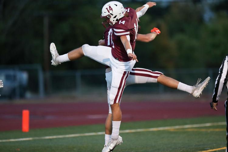 Prep football: Worsch carries Spartans past Raiders