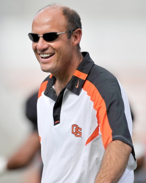 Oregon State's Mike Riley and UNLV's Mike Sanford share a close ...