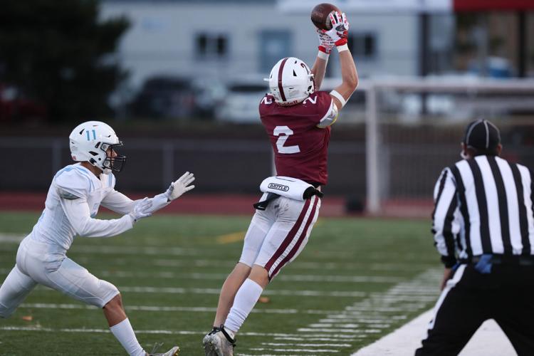 Prep football: Worsch carries Spartans past Raiders