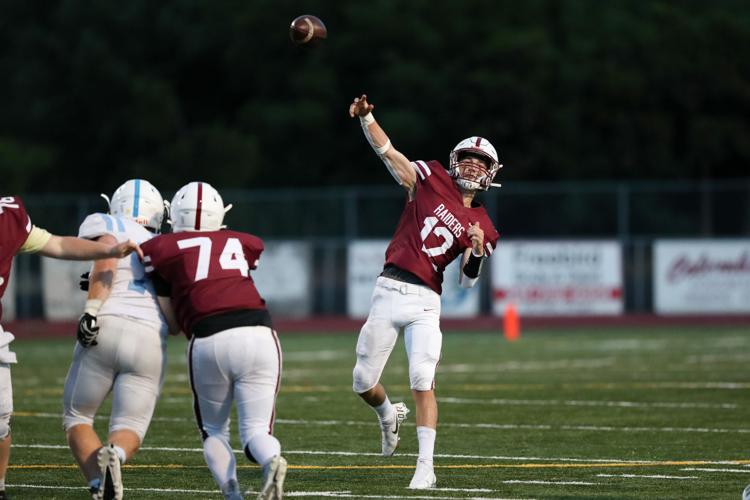Prep football: Worsch carries Spartans past Raiders