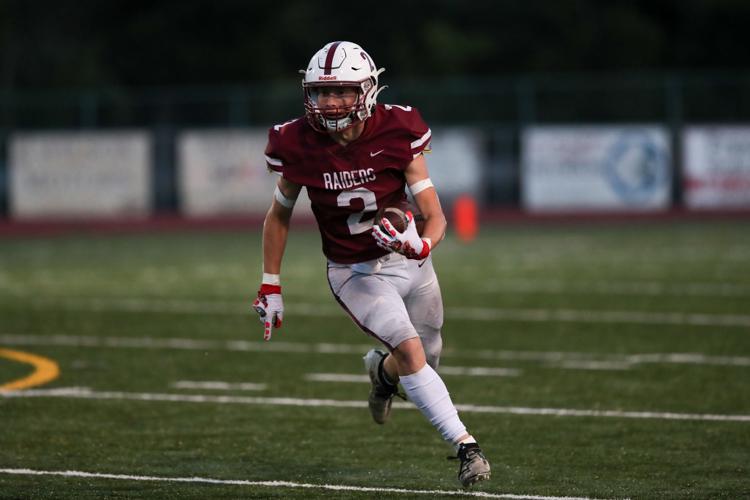 Prep football: Worsch carries Spartans past Raiders