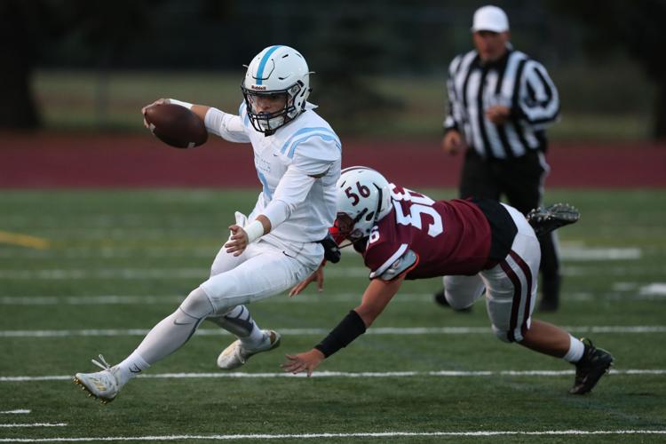 Prep football: Worsch carries Spartans past Raiders